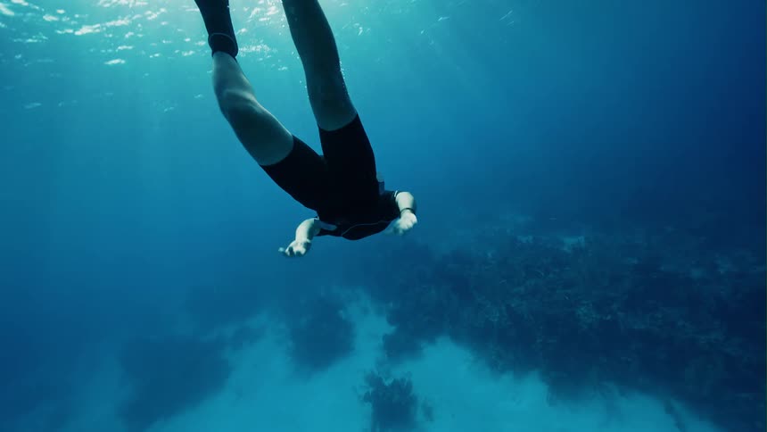 Man Diving Underwater