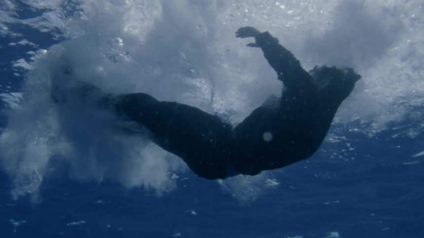 Man Diving Underwater